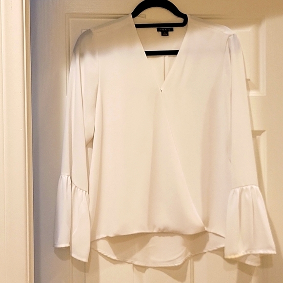 IMAN | Tops | Iman Snap Front White Blouse | Poshmark